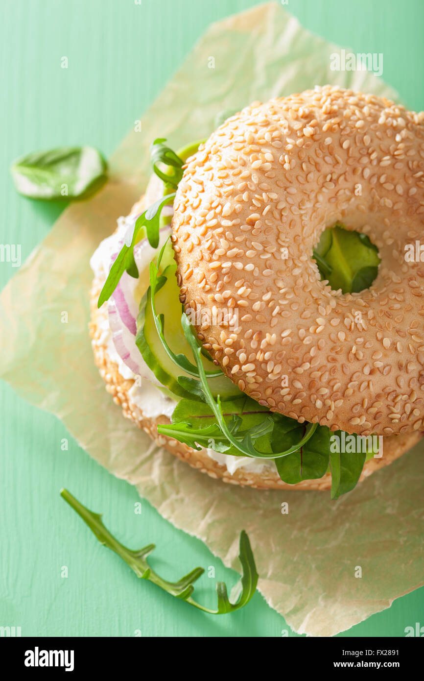 avocado sandwich on bagel with cream cheese onion cucumber arugula ...