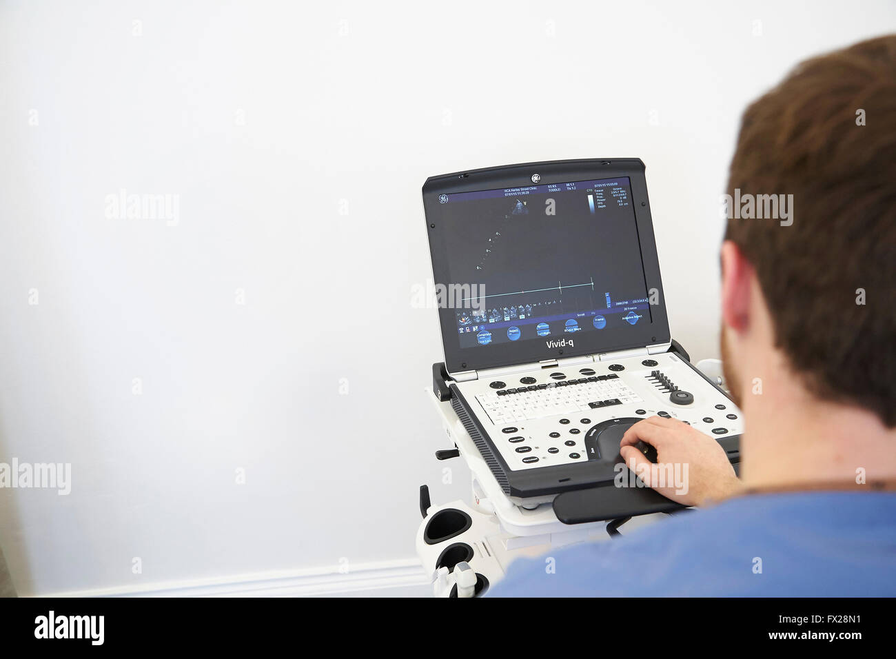 Doctor examining scan hi-res stock photography and images - Alamy