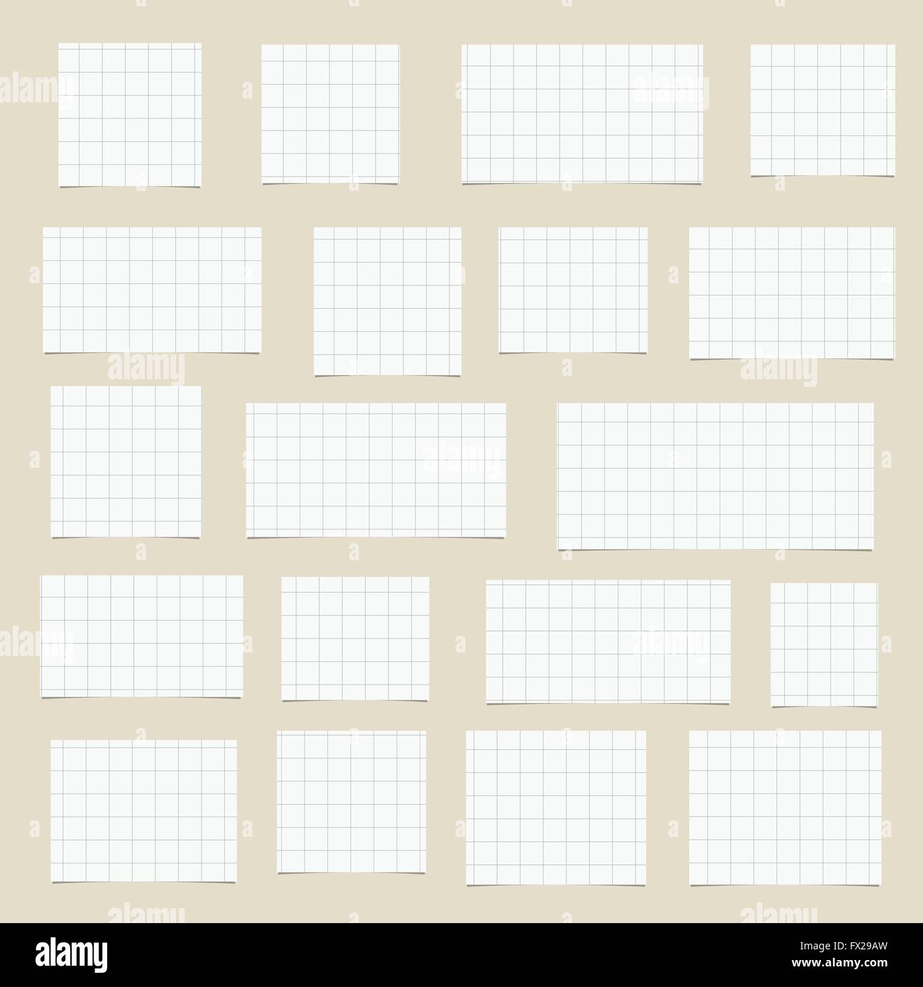 Pieces of torn white squared blank note paper sticked on brown ...