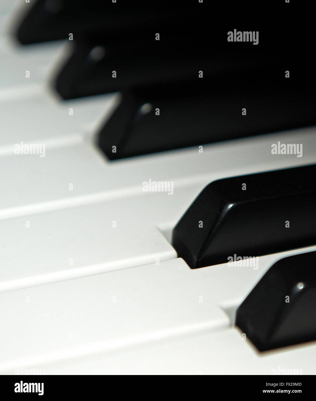Closeup image of black and white piano keys Stock Photo - Alamy