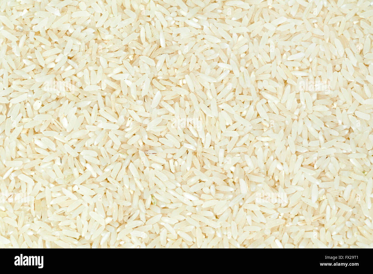Closeup shoot of raw white rice Stock Photo - Alamy
