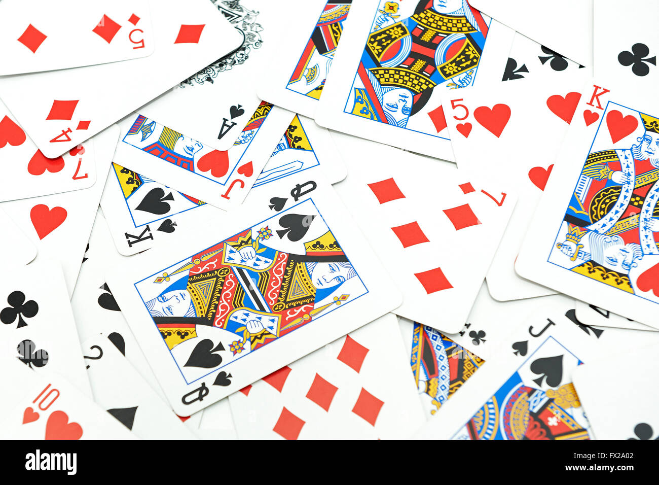 Closeup of a scattered deck of cards Stock Photo - Alamy