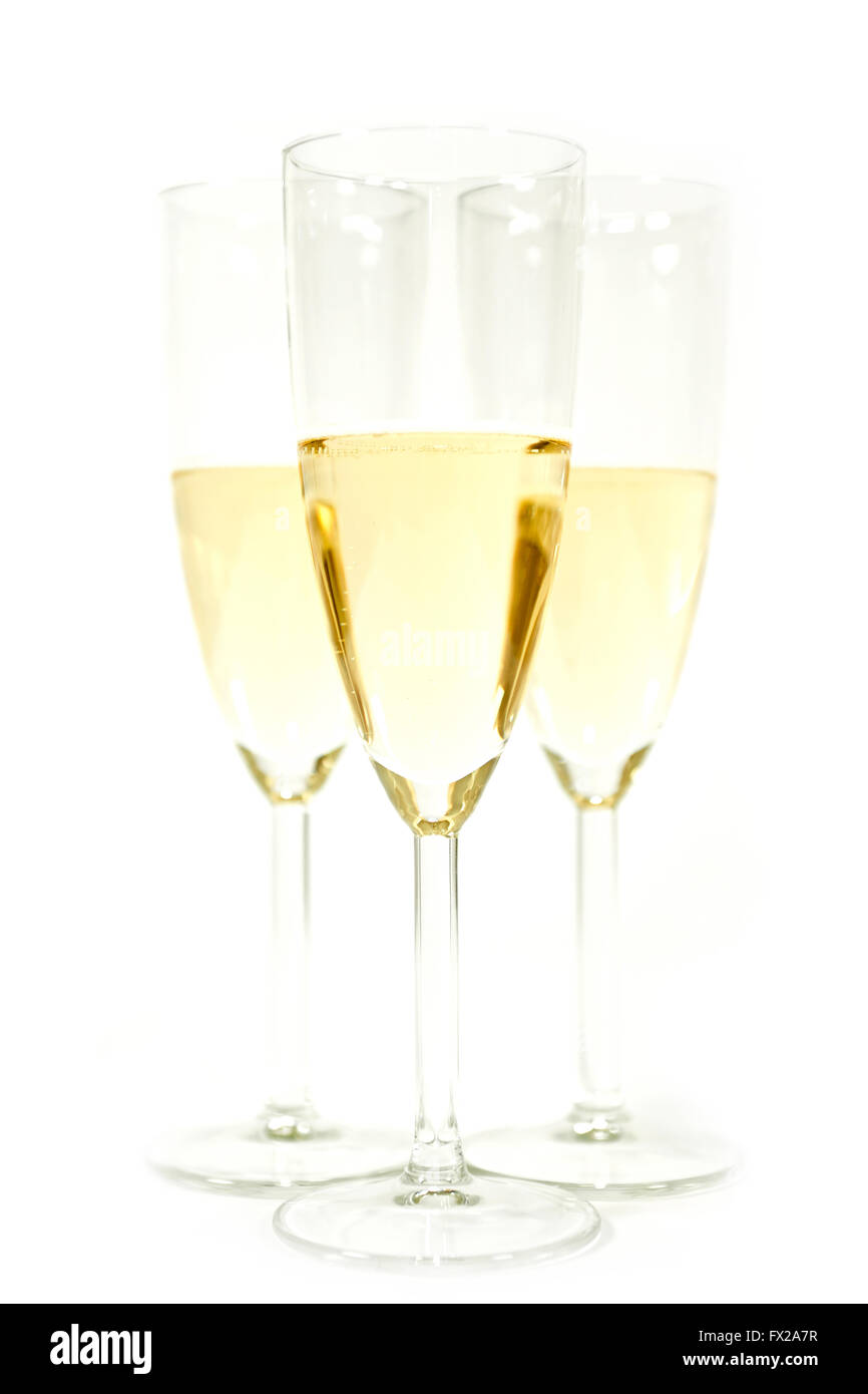Three glasses of champaign shoot in high key with white background ...