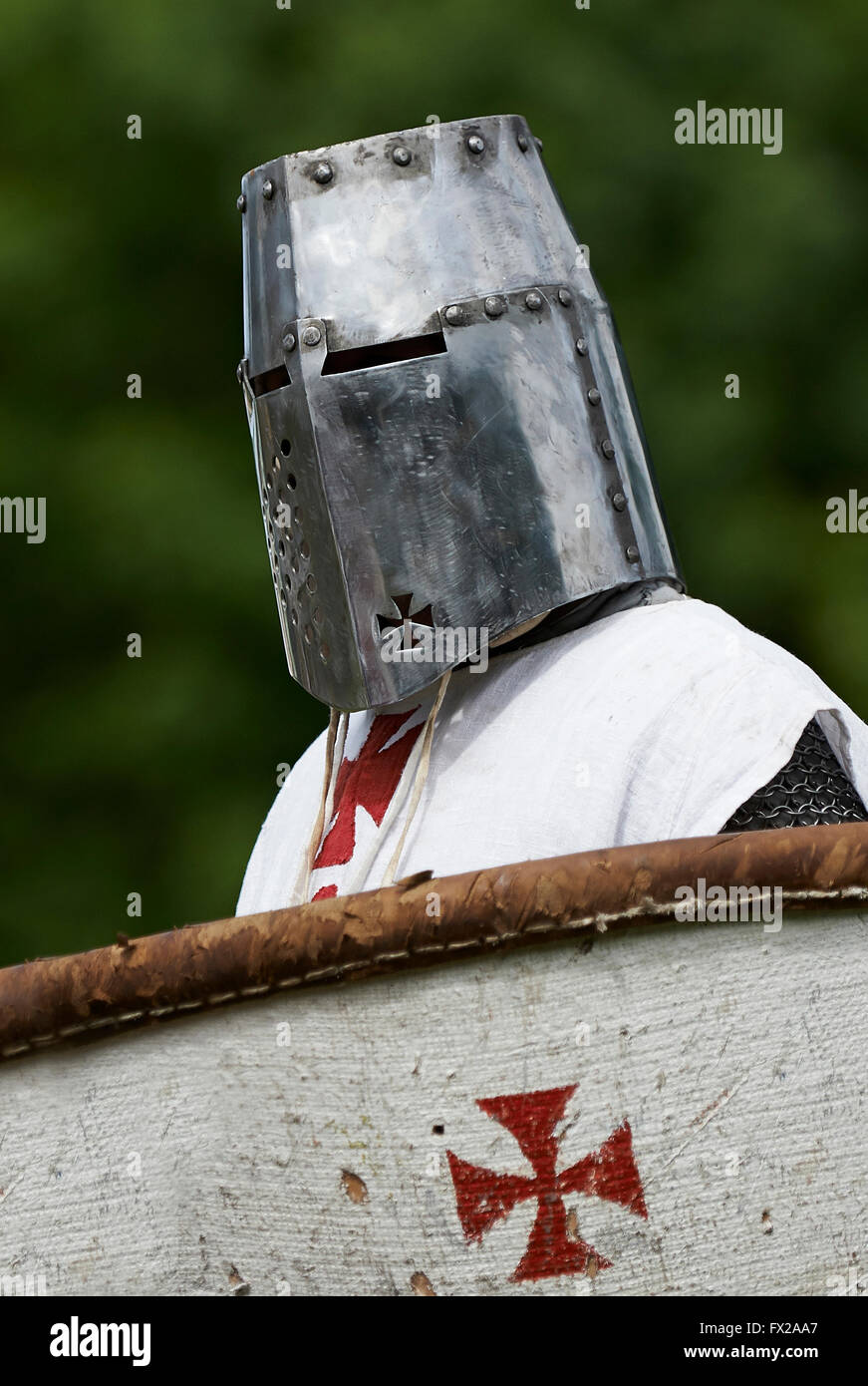 Medieval knight with shield on the battlefield Stock Photo - Alamy