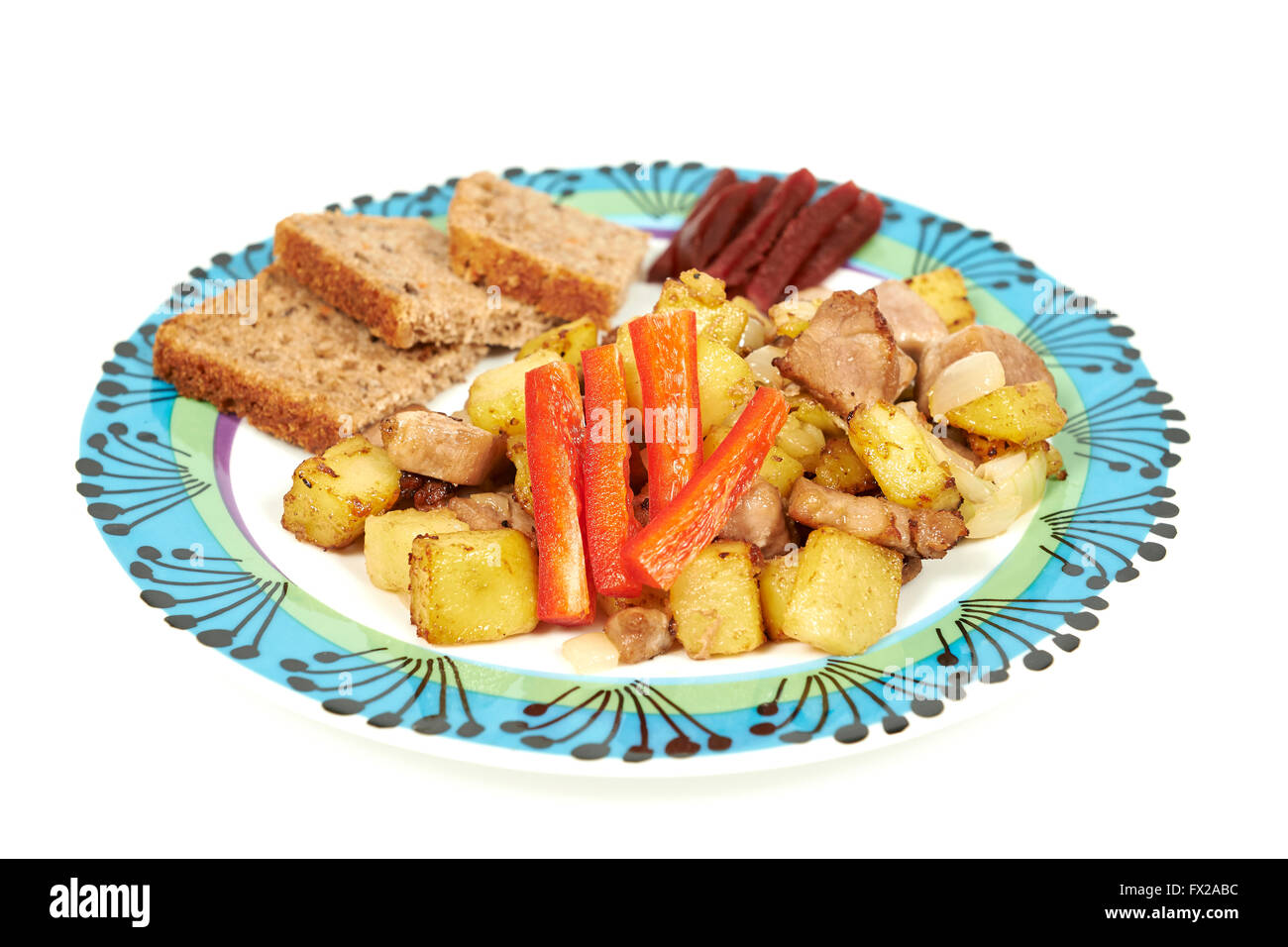 The dish Little pieces in a pan isolated on white Stock Photo - Alamy