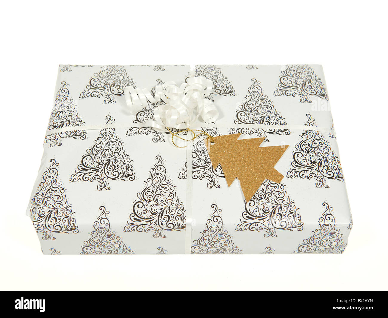 White christmas present isolated on a white background Stock Photo - Alamy