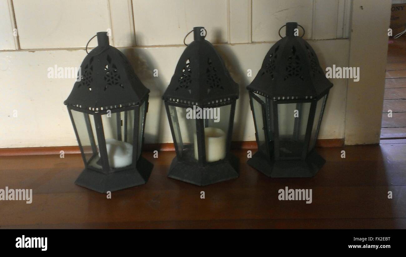 Three hanging lanterns Stock Photo - Alamy
