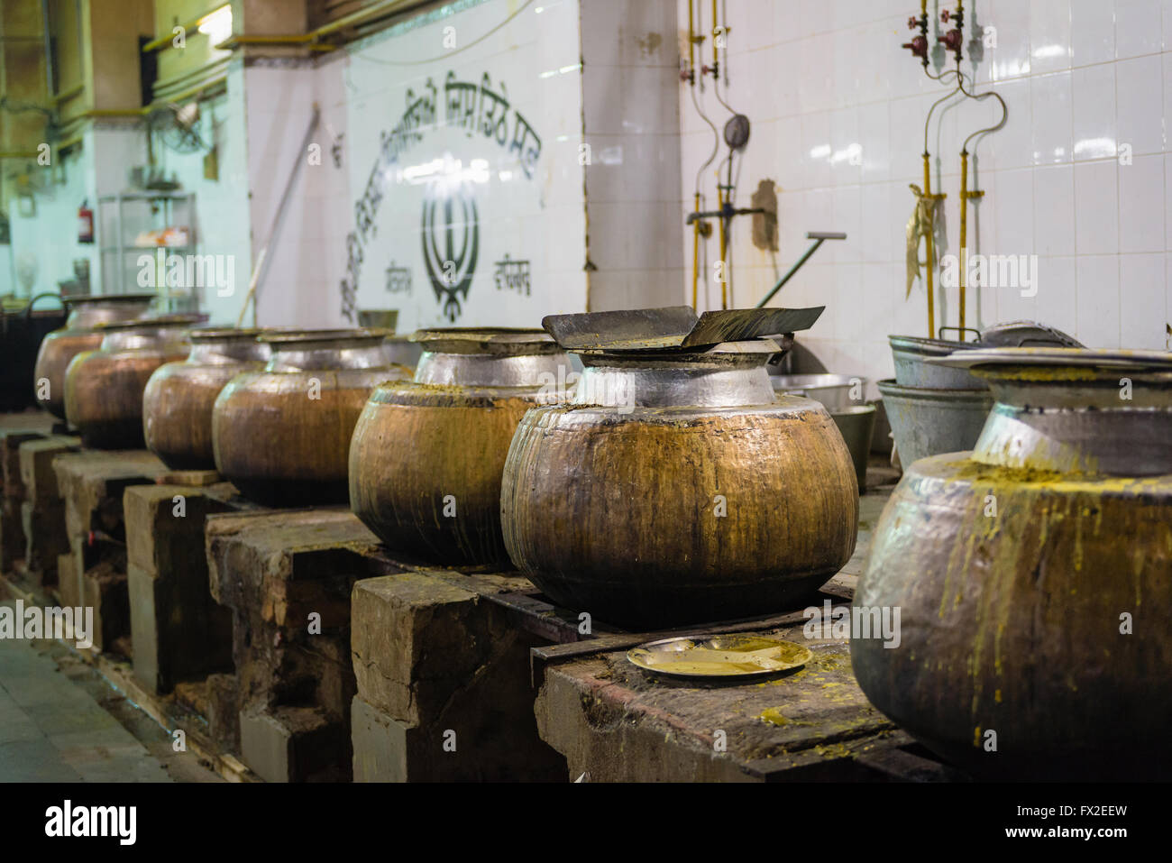 Cooking pots at Seikh temple in Old Delhi Stock Photo - Alamy