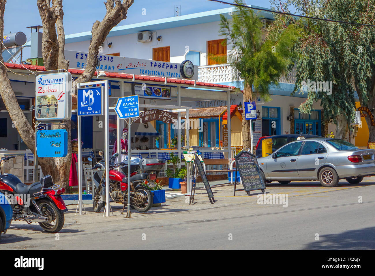 Street scene with signs in Massouri, Kalymnos, Greece Stock Photo - Alamy
