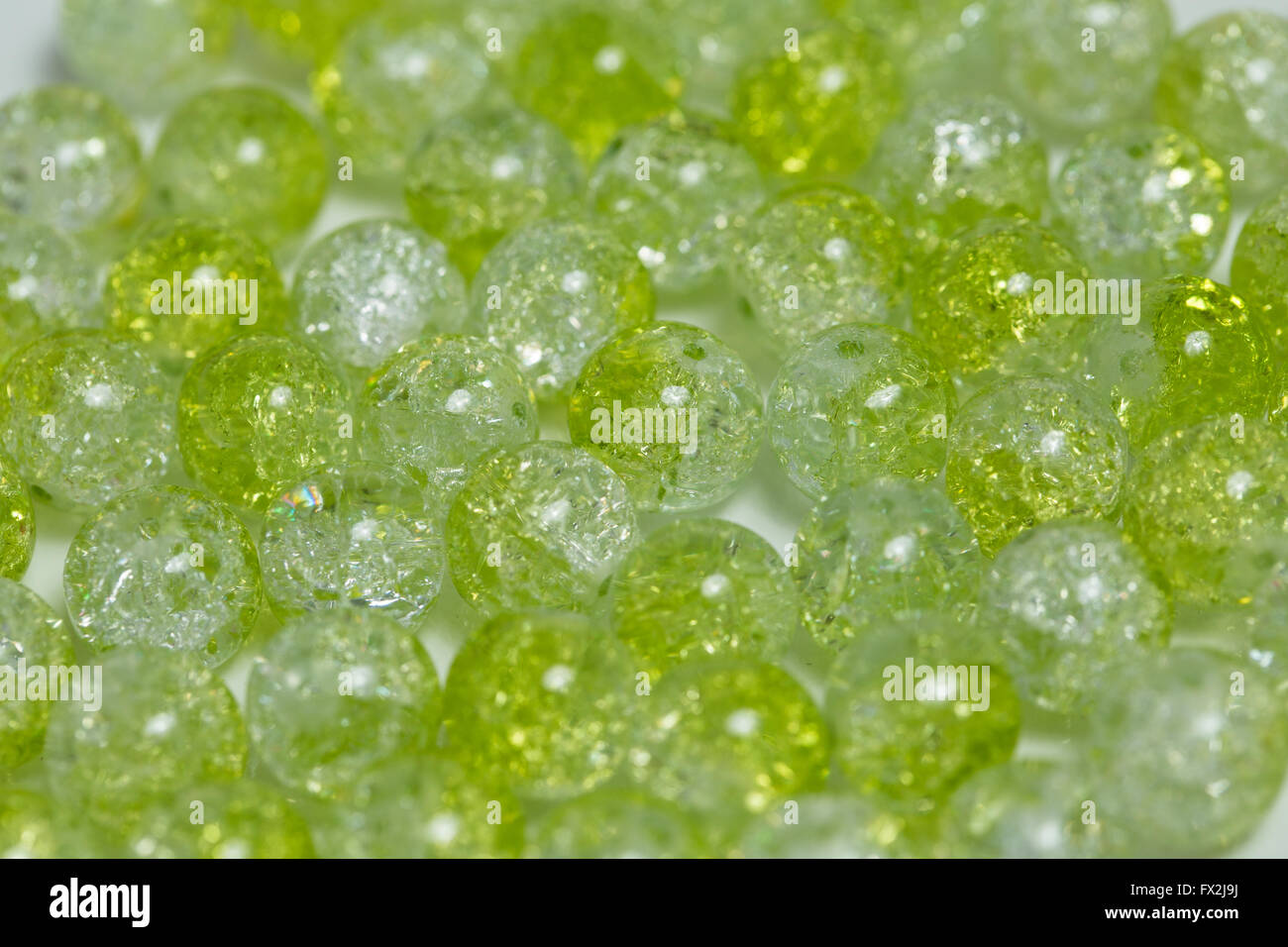 Rounded green quartz stones Stock Photo - Alamy