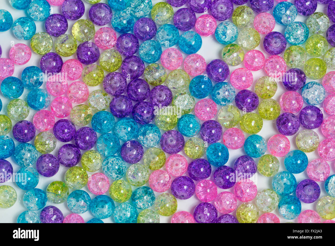 Pattern of rounded colorful quartz stones Stock Photo - Alamy