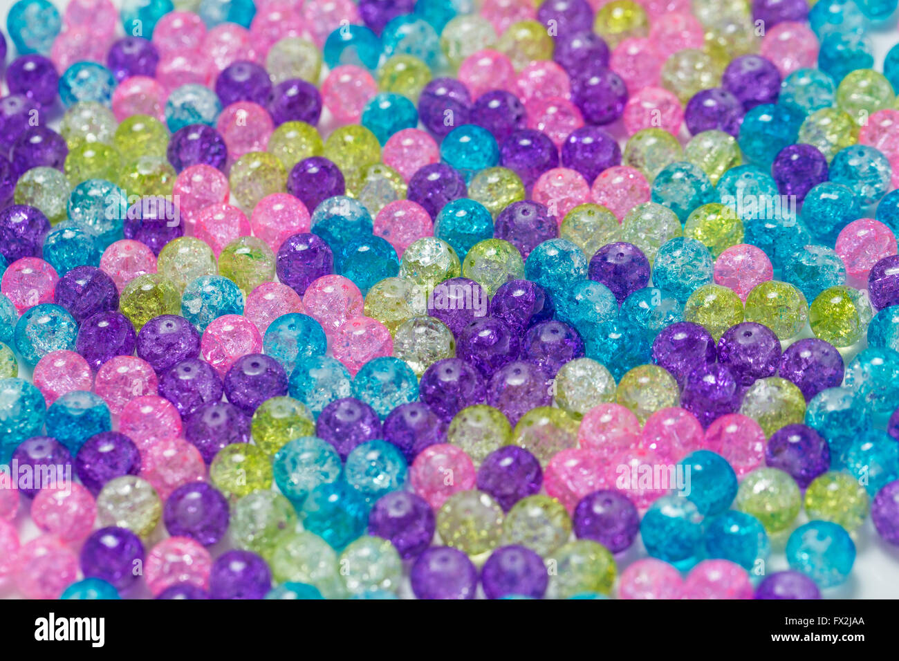 Pattern of rounded colorful quartz stones Stock Photo - Alamy