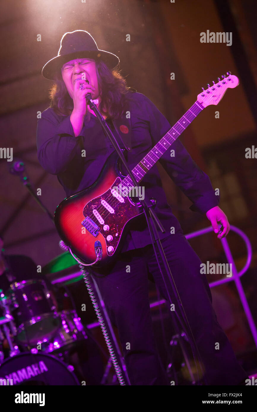 rock musician playing a Fender Stratocaster electric guitar during the ...