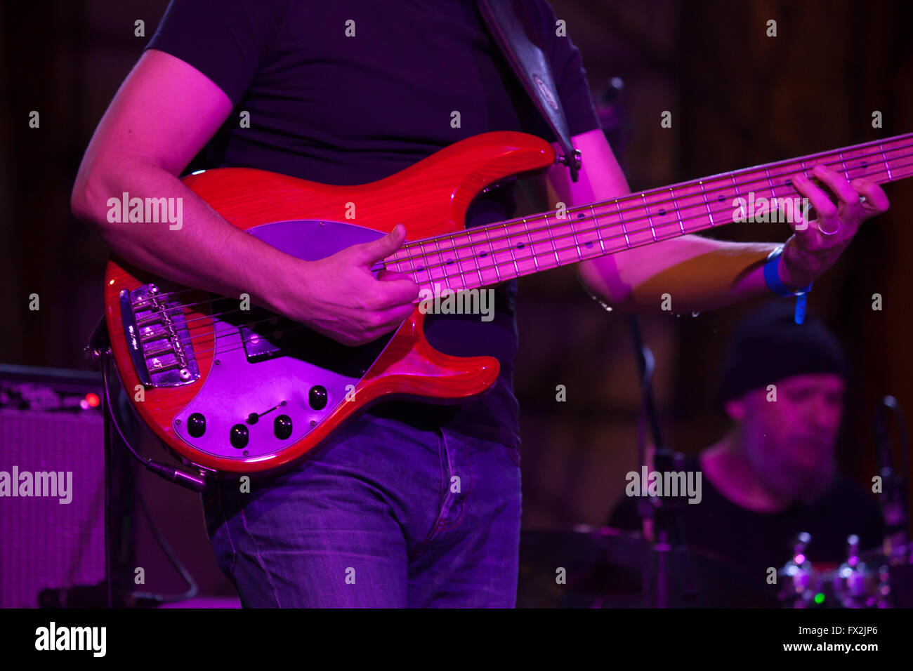 rock musician playing a Fender Stratocaster electric guitar during the ...