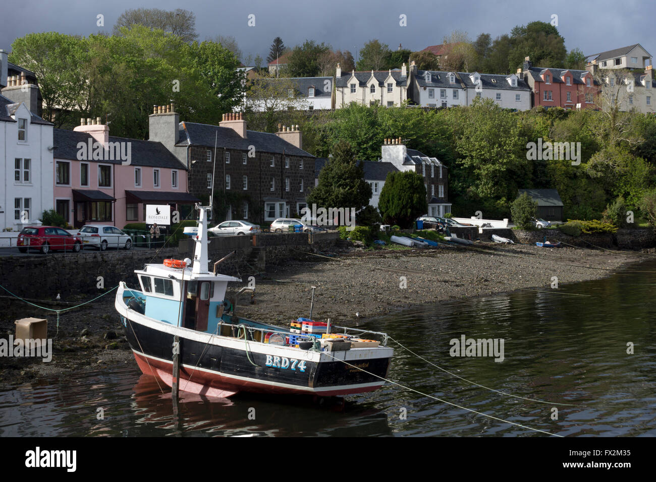 A fishing boat, moored in the harbour at Portree, Skye, Scotland Stock ...
