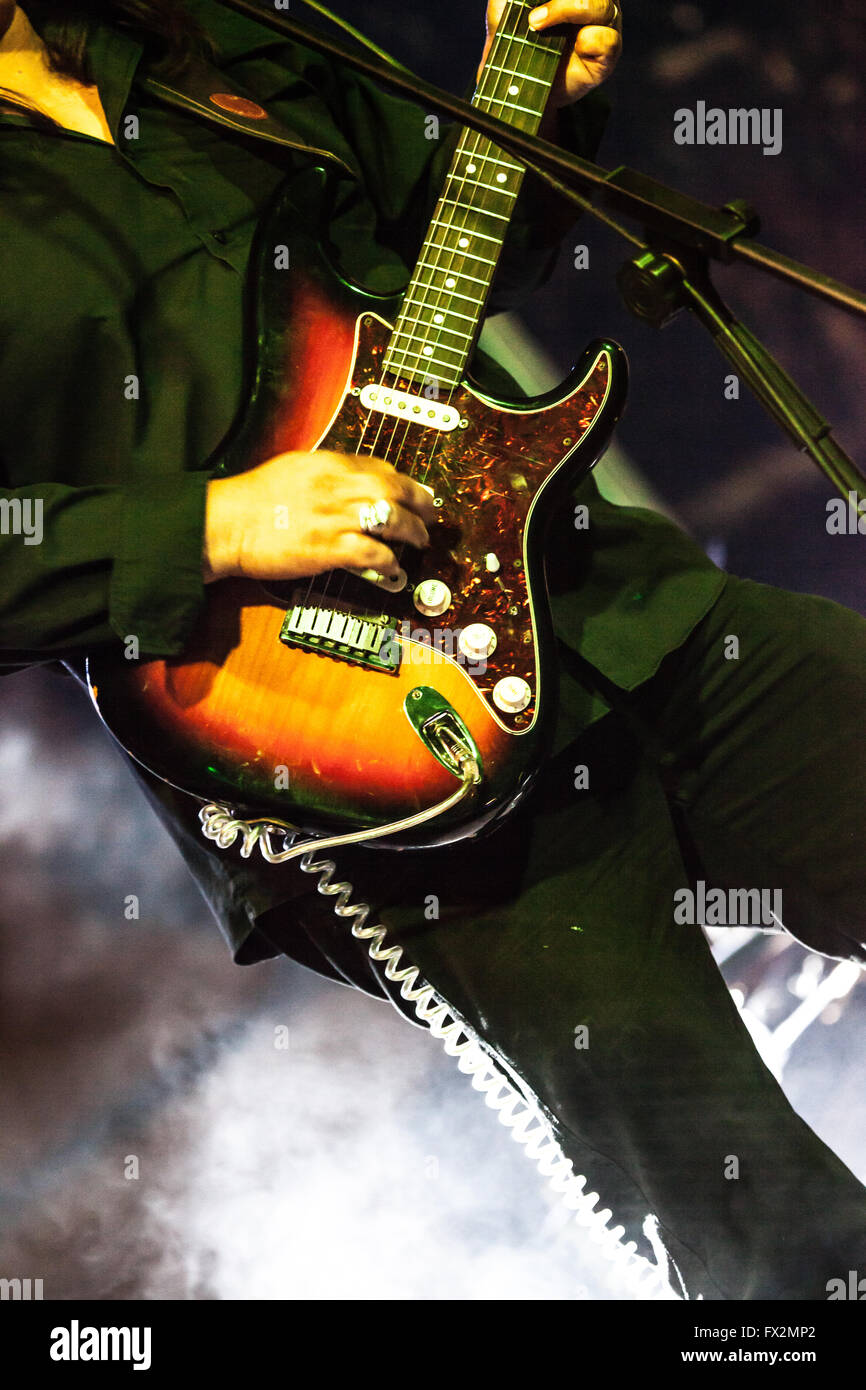 rock musician playing a Fender Stratocaster electric guitar during the ...