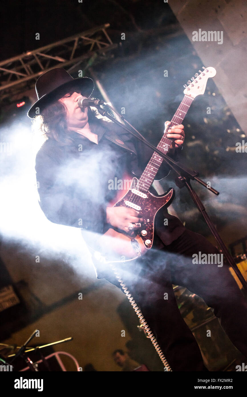 rock musician playing a Fender Stratocaster electric guitar during the ...