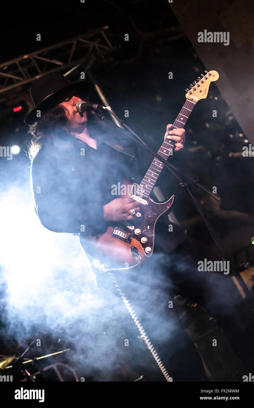 rock musician playing a Fender Stratocaster electric guitar during the ...
