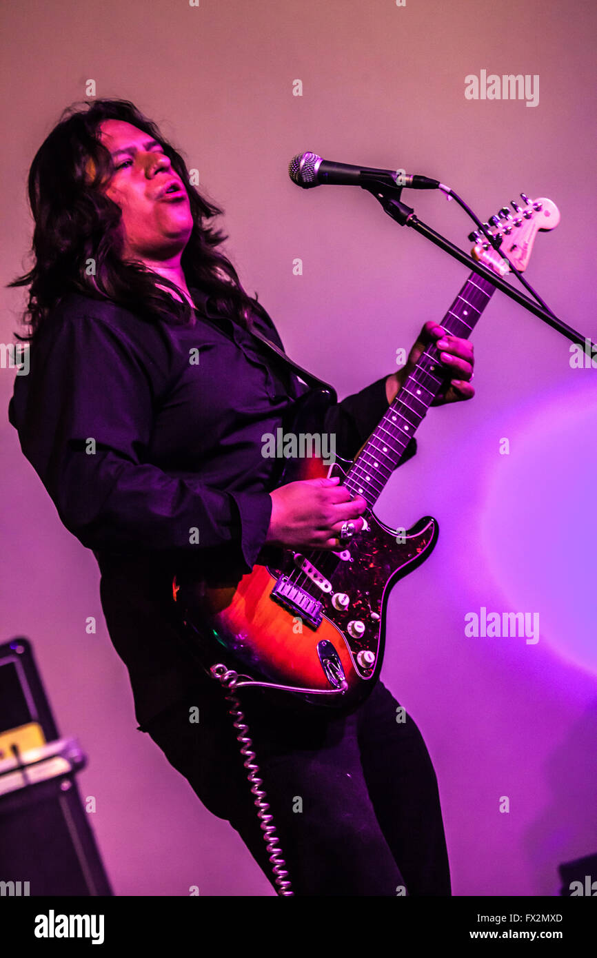 rock musician playing a Fender Stratocaster electric guitar during the ...