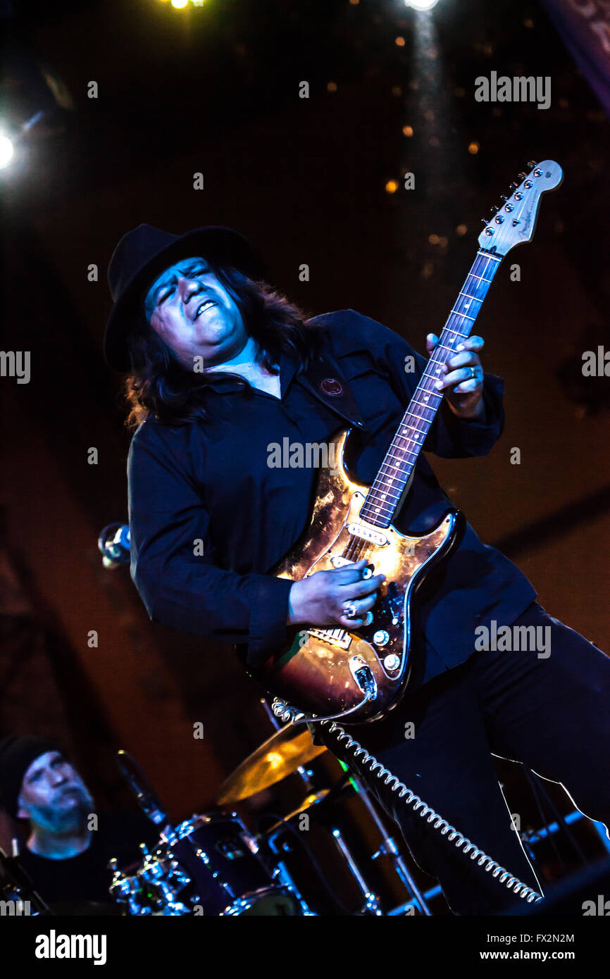rock musician playing a Fender Stratocaster electric guitar during the ...