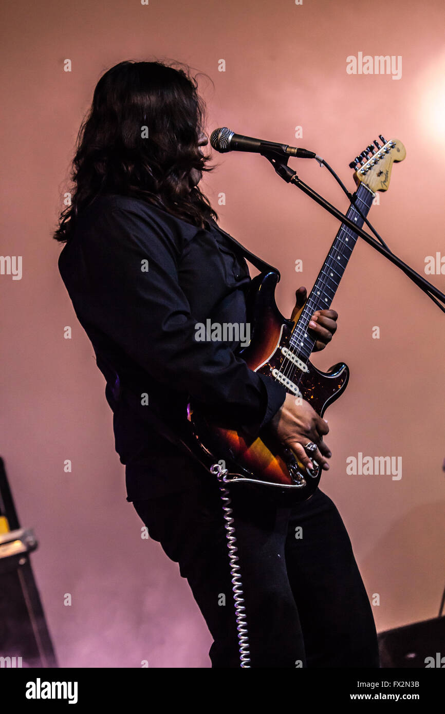 rock musician playing a Fender Stratocaster electric guitar during the ...