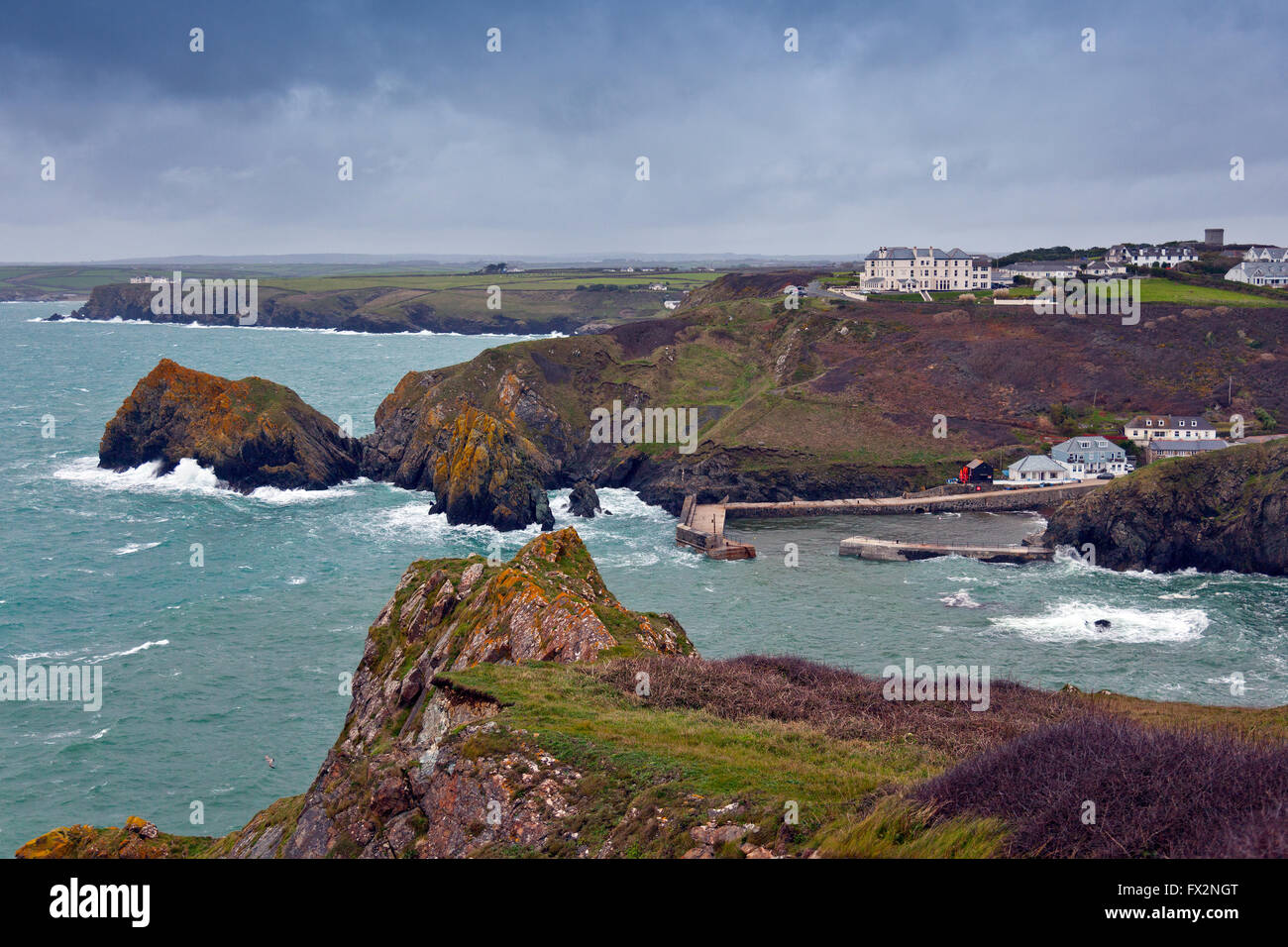 Heavy winter seas at the harbour entrance to Mullion Cove on the Lizard ...