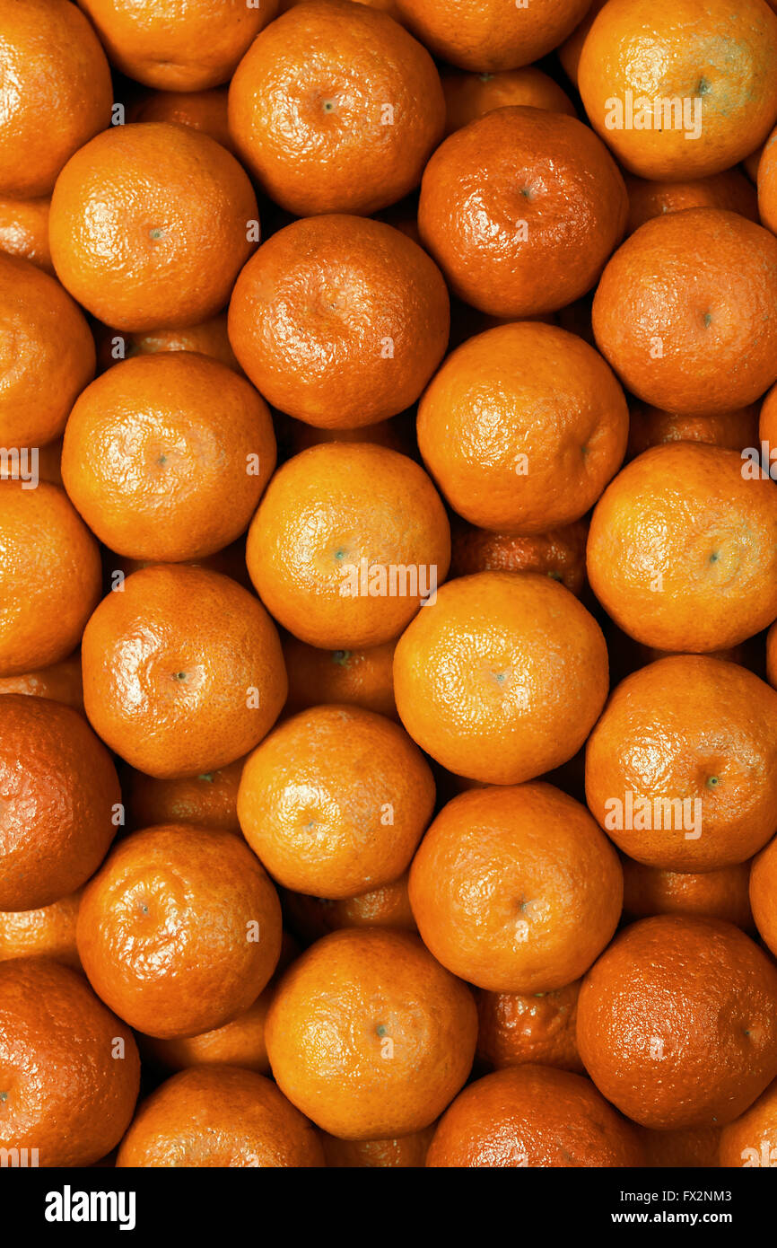 Lush textured mandarin background Stock Photo - Alamy