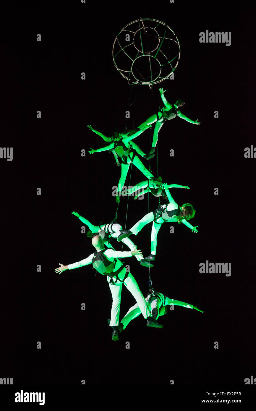 acrobats hanging in the open air at night during the LA NOCHE EN BLANCO ...