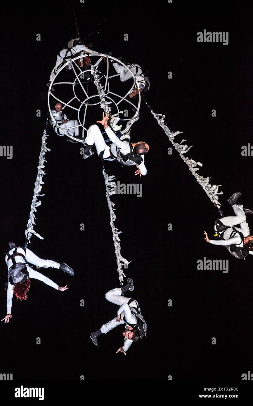acrobats hanging in the open air at night during the LA NOCHE EN BLANCO ...
