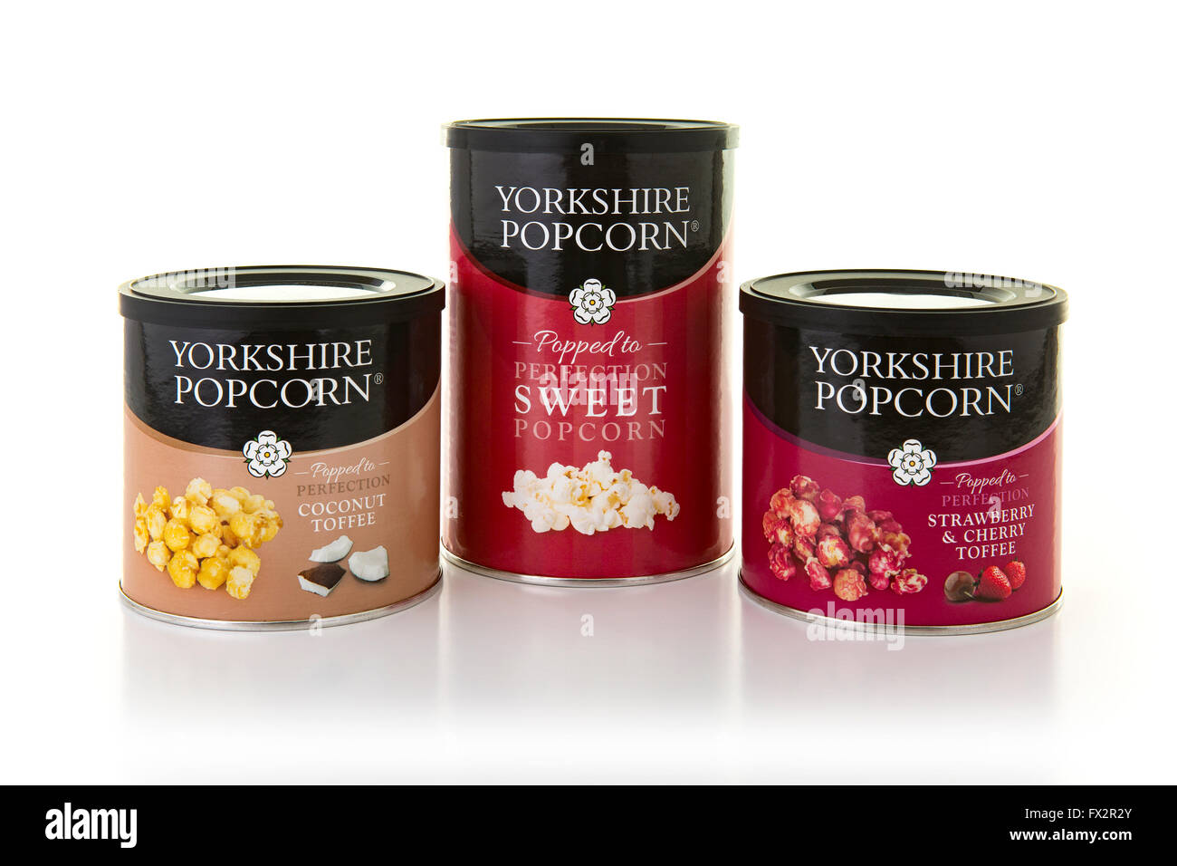 Three Tins of Yorkshire Popcorn on a White Background Stock Photo - Alamy