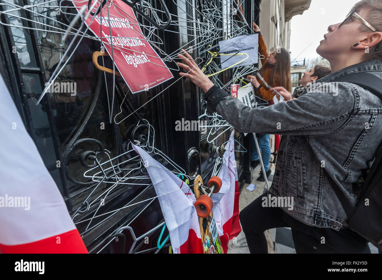 London, UK. 9th April, 2016. Protesters hang wire coat hangers, the ...