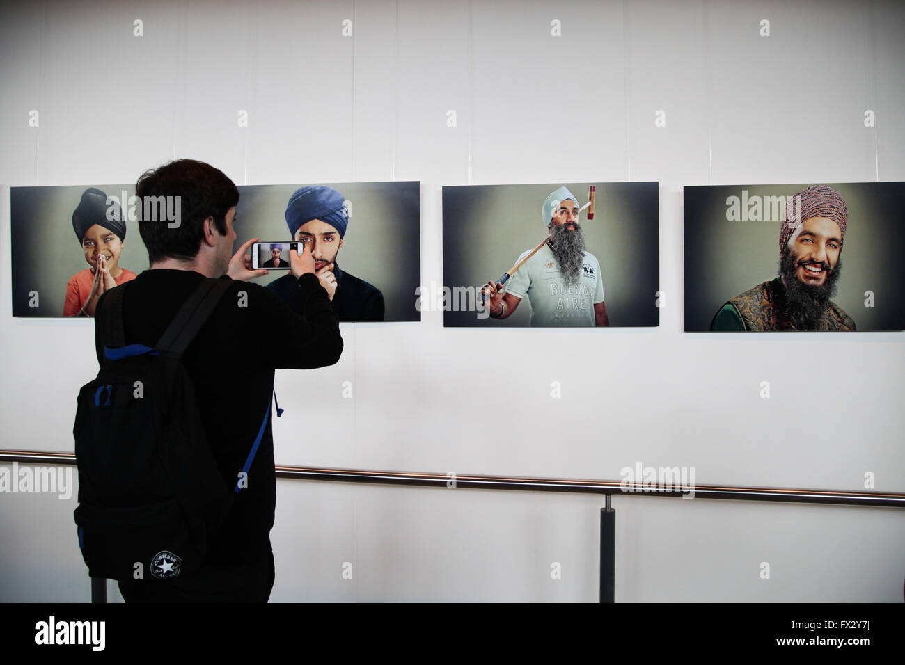 City Hall, London, UK. 9 April 2016. A man takes a photos of The Singh ...