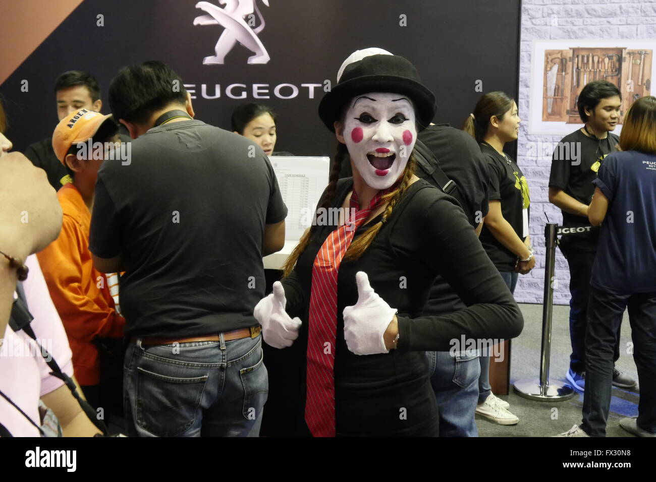 A mime at the Peugeot car show area. Manila International Auto Show ...