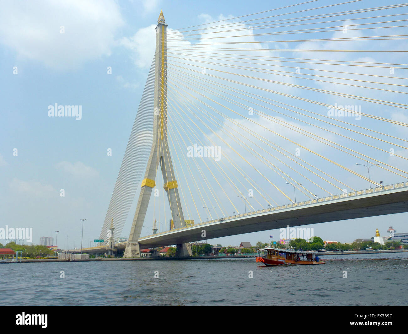A boat passes the Rama VIII bridge in Bangkok, Thailand, 04 March 2016 ...