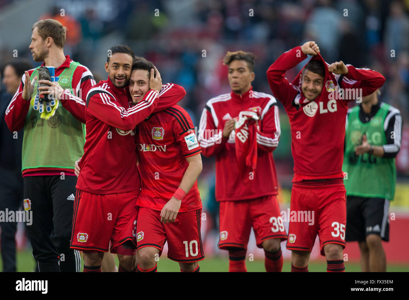 Cologne, Germany. 10th Apr, 2016. Leverkusen's (front L-R) Karim ...
