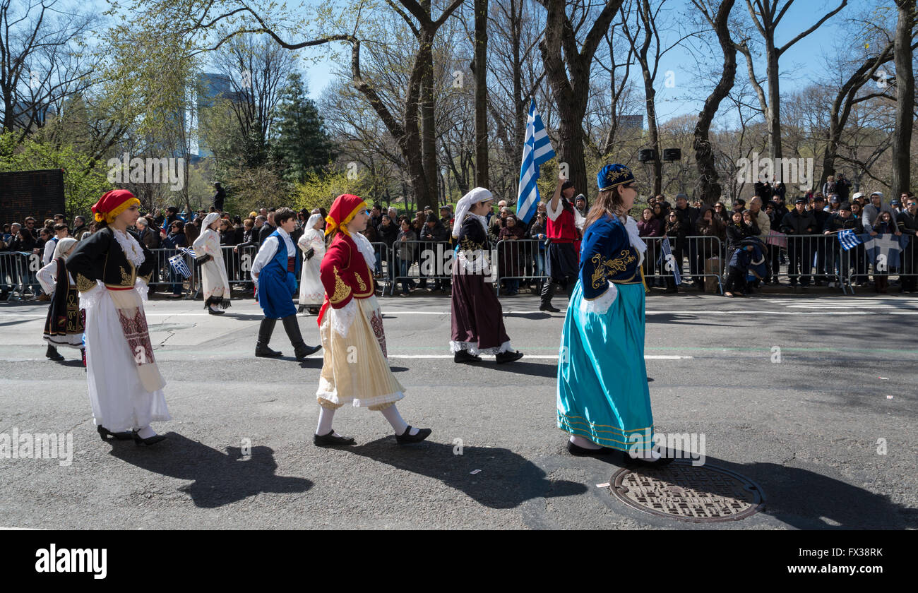 Children and teenagers wearing traditional Greek costume dancing and ...