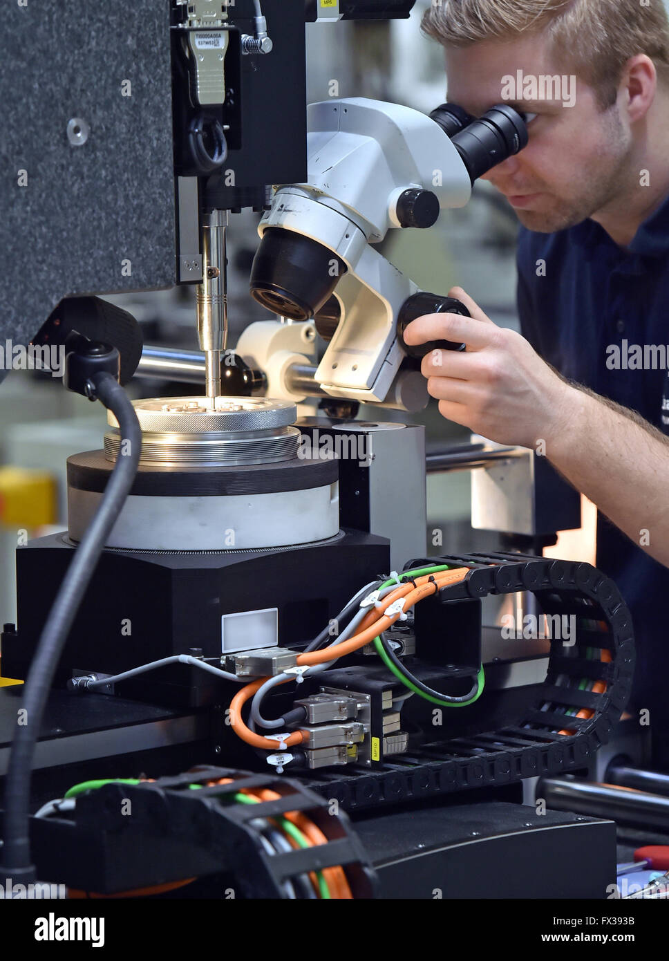 An Enka Tecnica employee controls the production of spinnerets in the ...