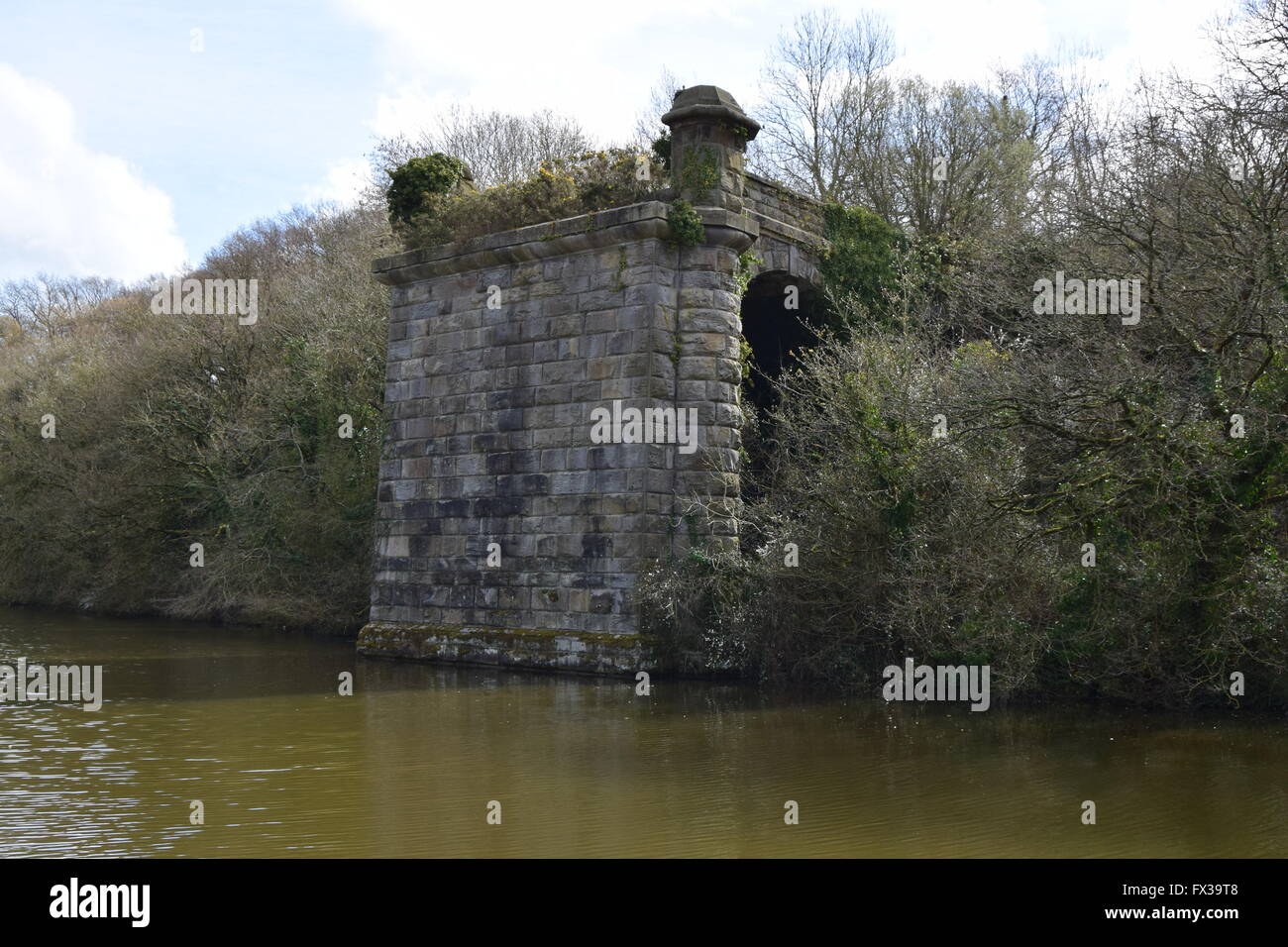 Ruined base of the Victorian former railway bridge over the River ...