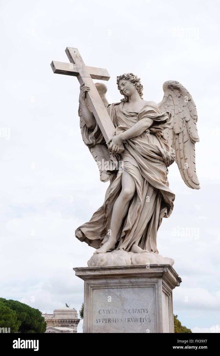 Angel with the cross hi-res stock photography and images - Alamy