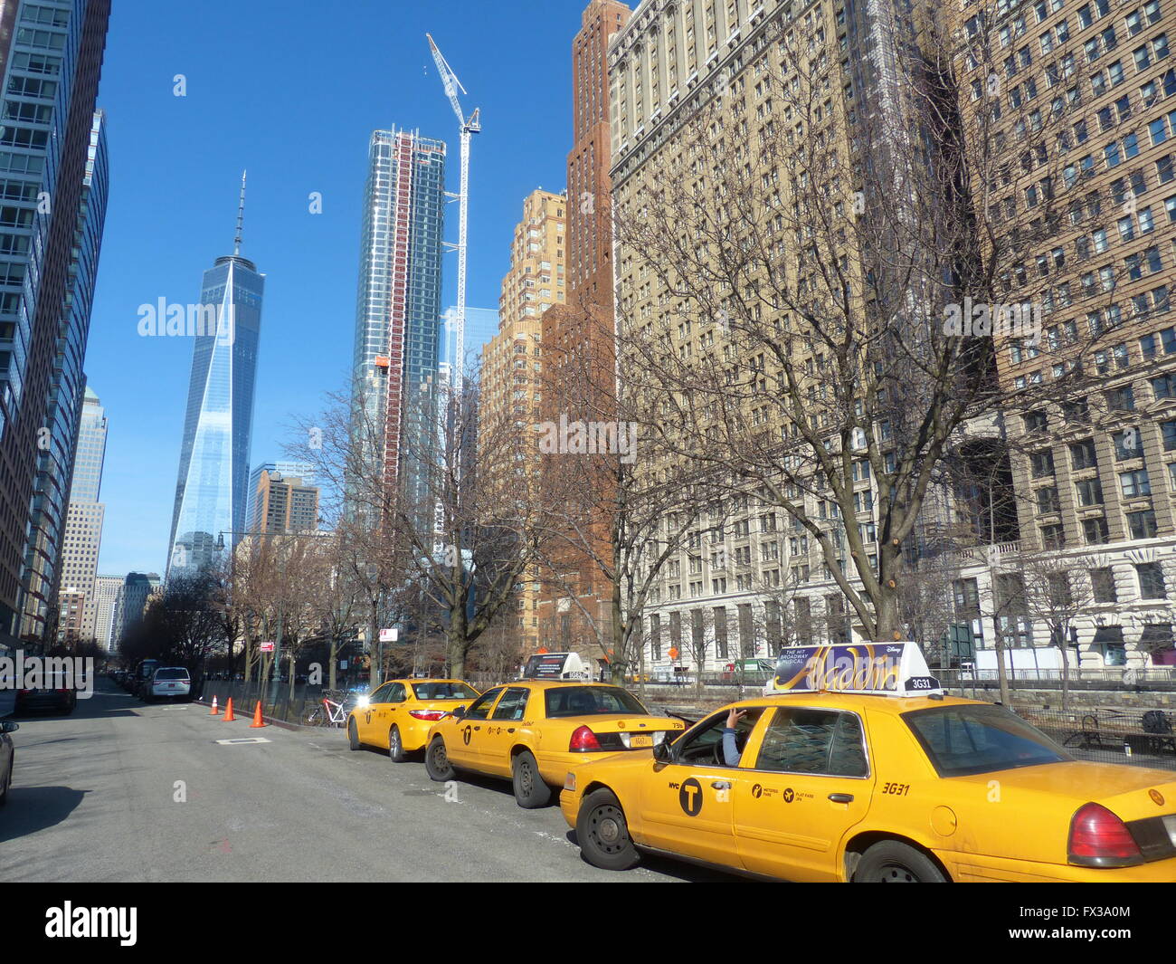Waiting taxicabs with One World Trade Center, a.k.a. Freedom Tower ...