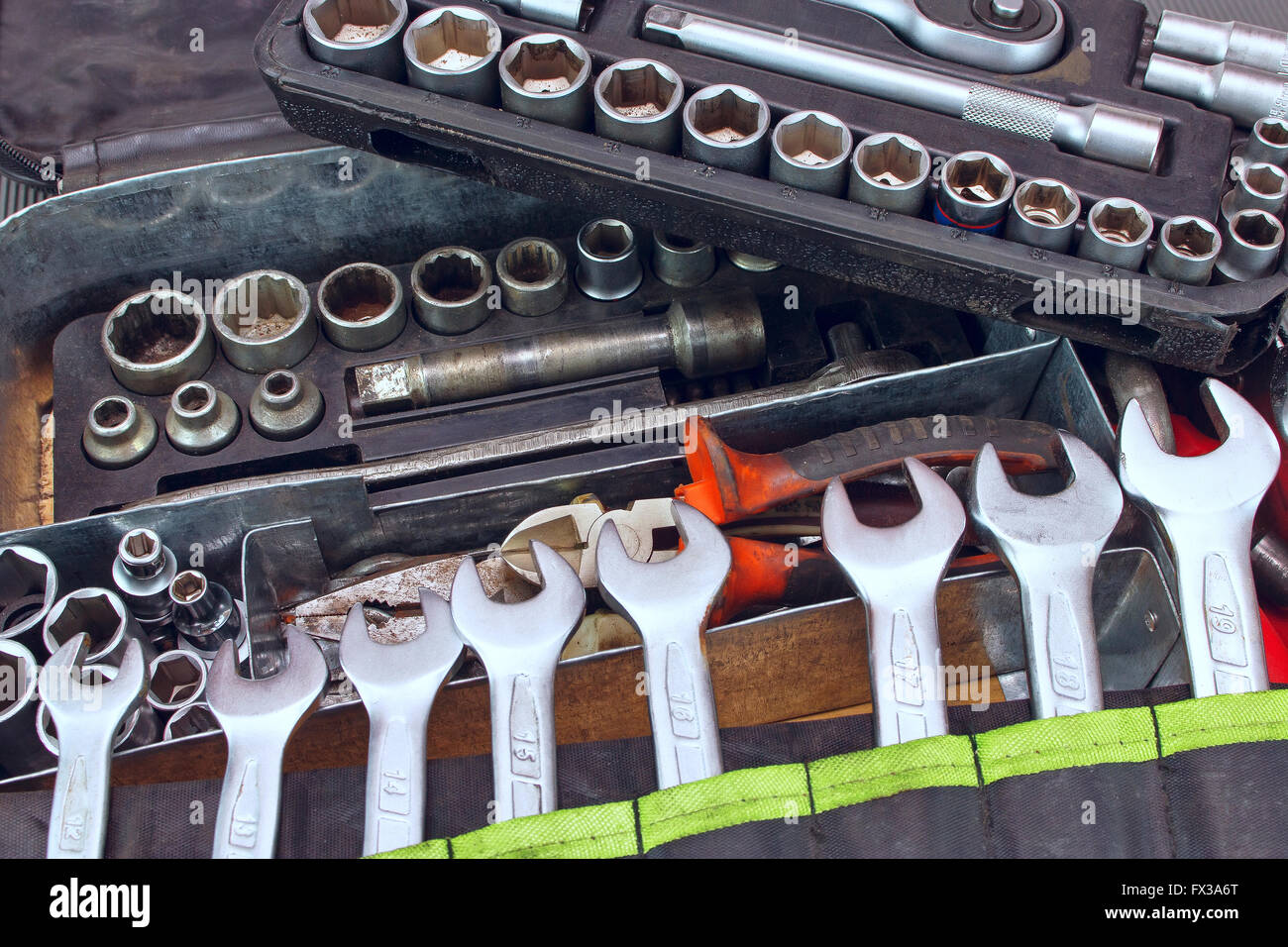 Dirty set of hand tools on a vintage background Stock Photo - Alamy