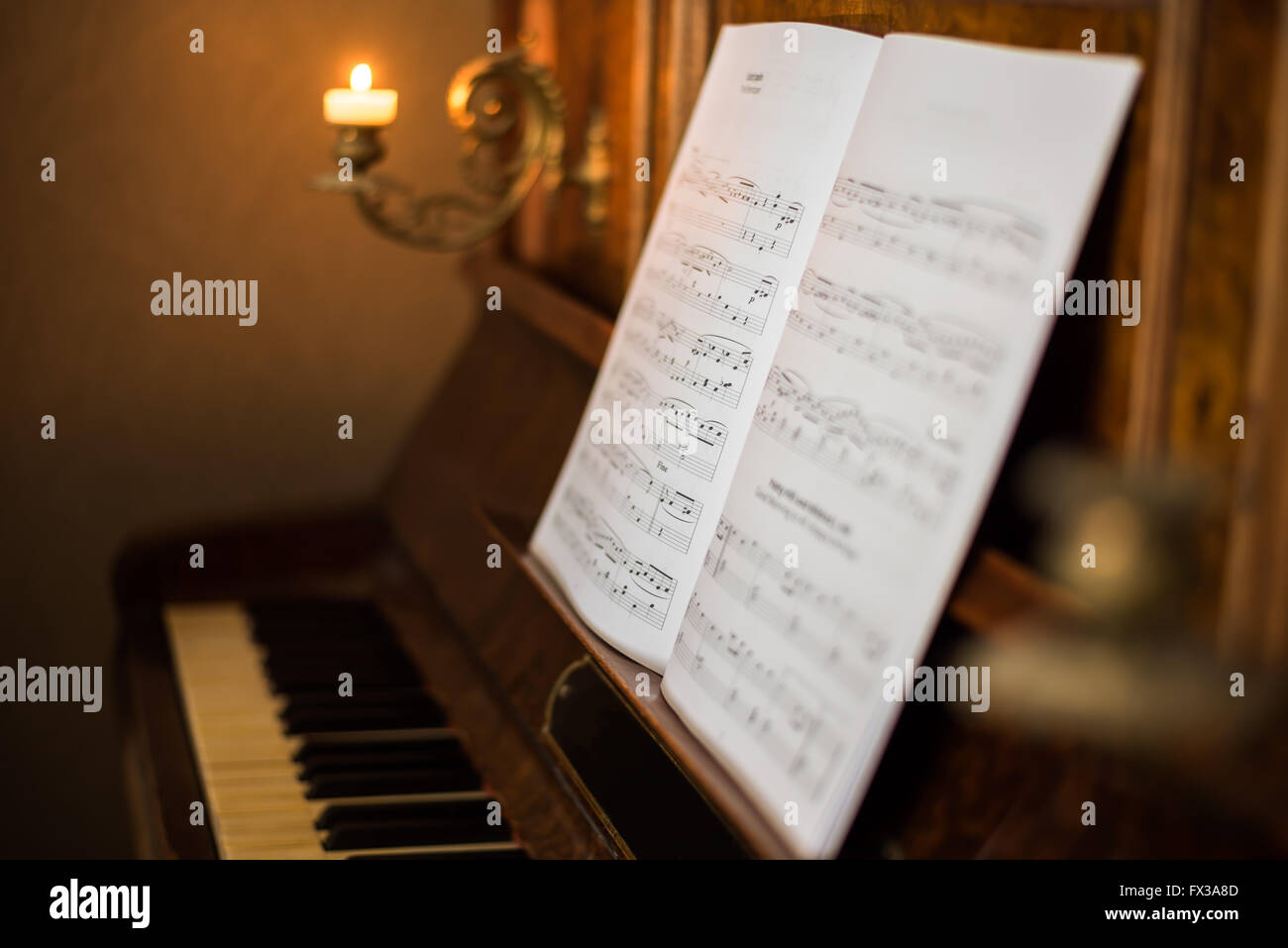 Book with piano sheet music hi-res stock photography and images - Alamy