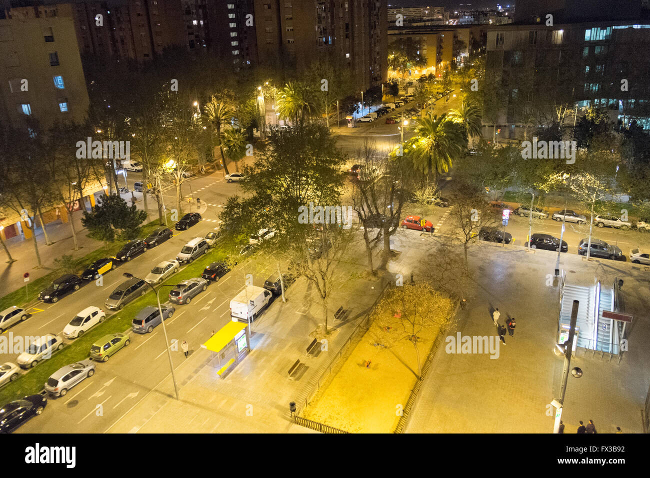 Wide boulevard of Rambla de Prim and Carrer de Llull illuminated at ...