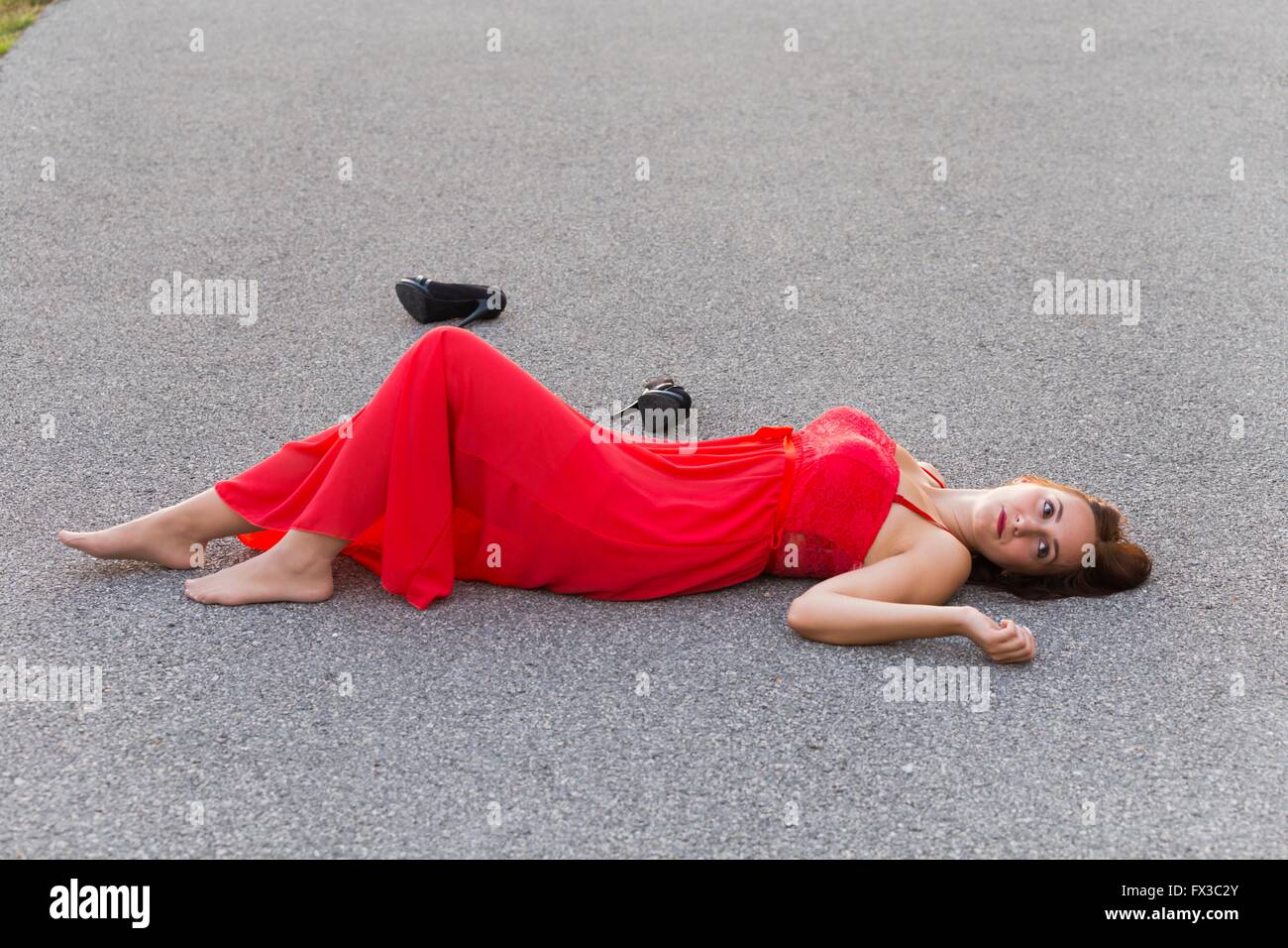 Adolescent teen laying lying down position posture Stock Photo - Alamy