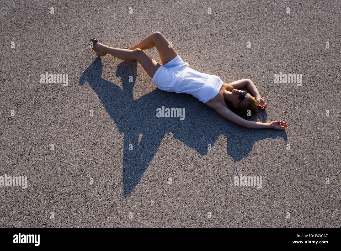 Adolescent teen laying lying down position posture Stock Photo - Alamy