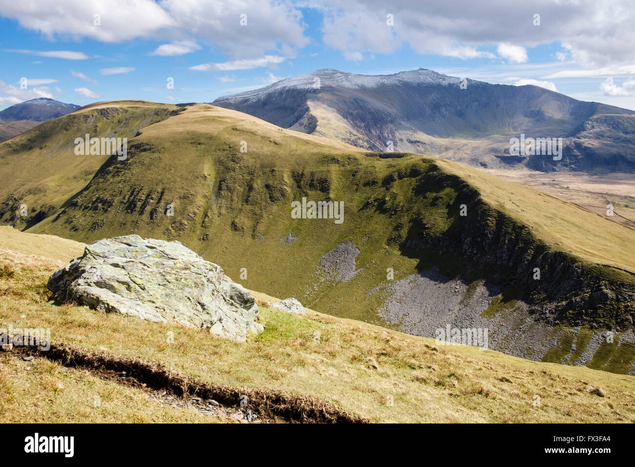 Looking at Moel Cynghorion and snowcapped Mount Snowdon beyond from ...