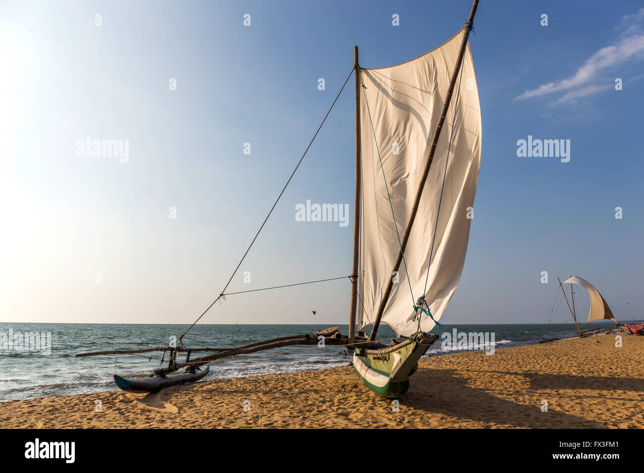 Old outrigger canoe on beach hi-res stock photography and images - Alamy