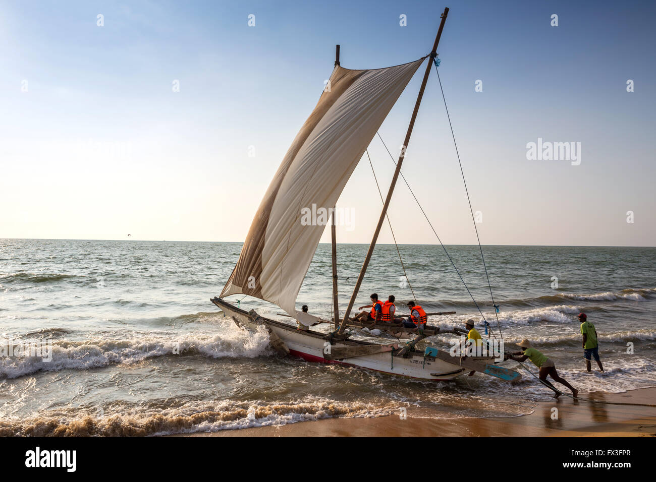 View of Traditional Outrigger Fishing Boat (Oruva) with Sail on Negombo ...