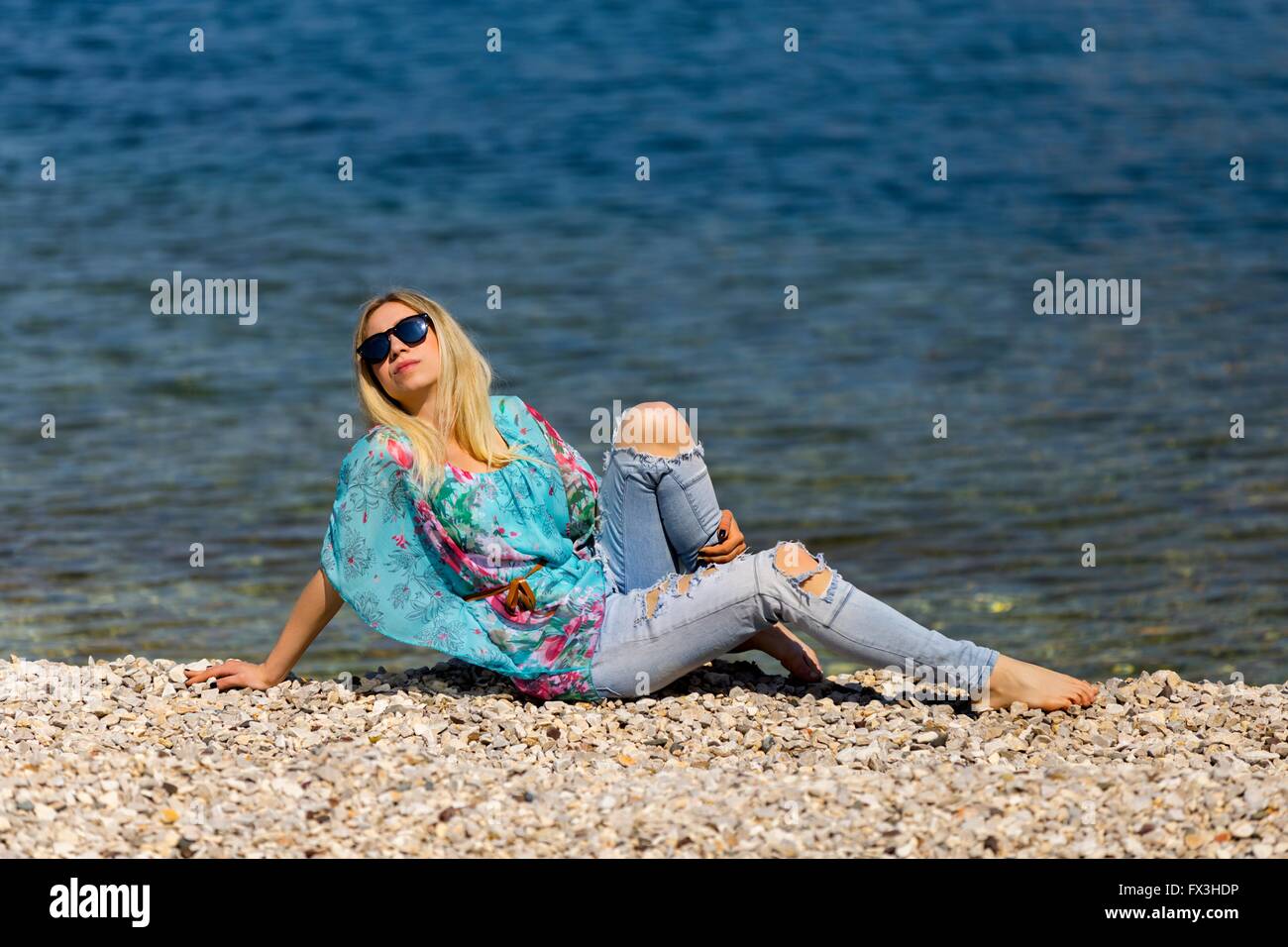 Adolescent teen laying lying down position posture Stock Photo - Alamy
