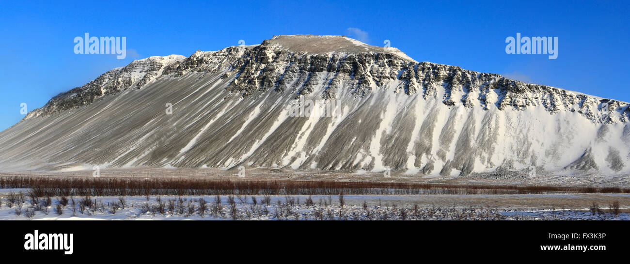 Winter snow over the Lava fields and Hafnarfjall mountain near ...